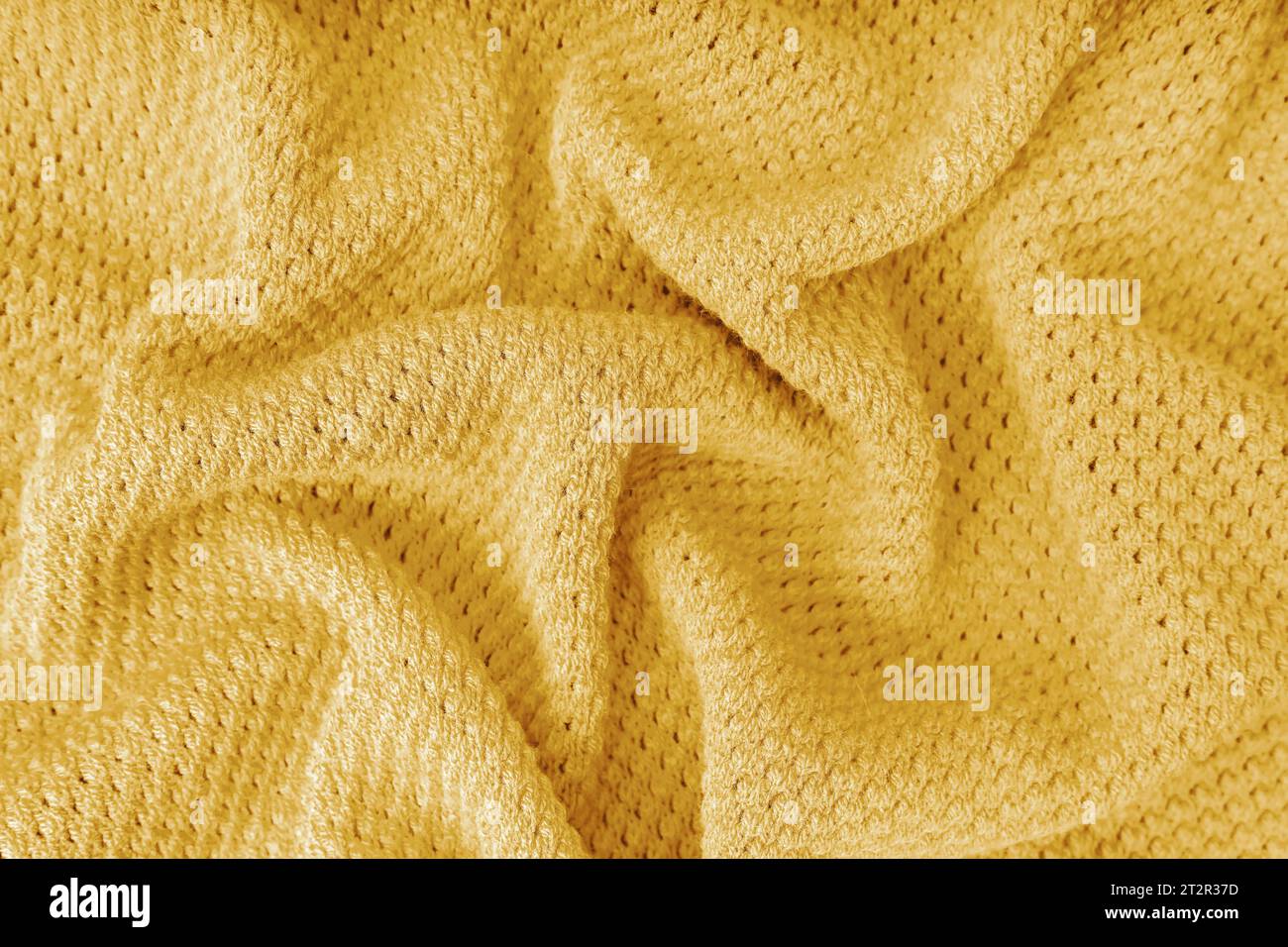 Yellow color crumpled, wrinkled knitting wool cloth texture. Background ...