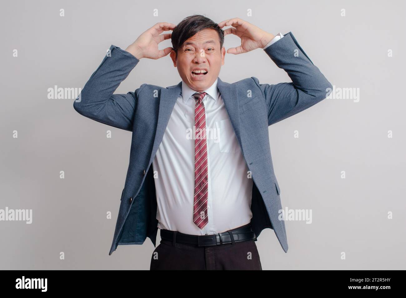Angry japanese businessman hi-res stock photography and images - Alamy