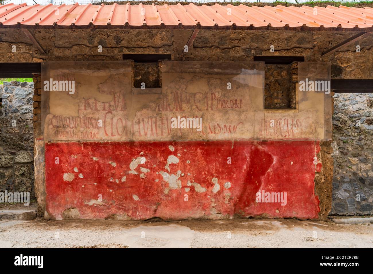 POMPEI ITALY - SEPTEMBER 20 2023: Ancient paintings decorate walls of ...
