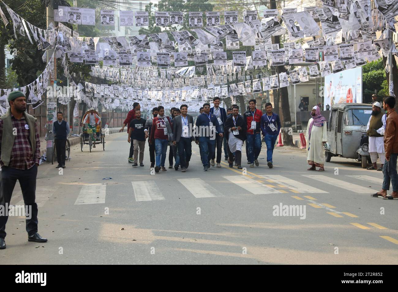 An election campaign poster hangs along a street during the Dhaka North ...