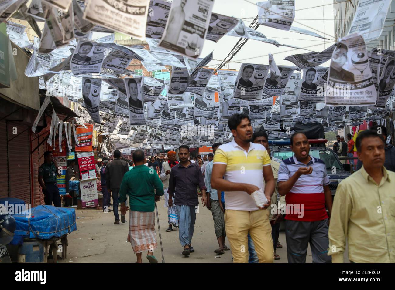 An election campaign poster hangs along a street during the Dhaka North ...