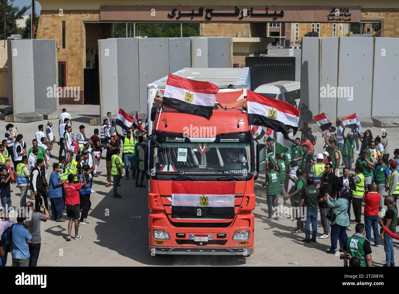 Rafah, Egypt. 21st Oct, 2023. Aid convoy trucks return to the Egyptian side after delivering aid ...