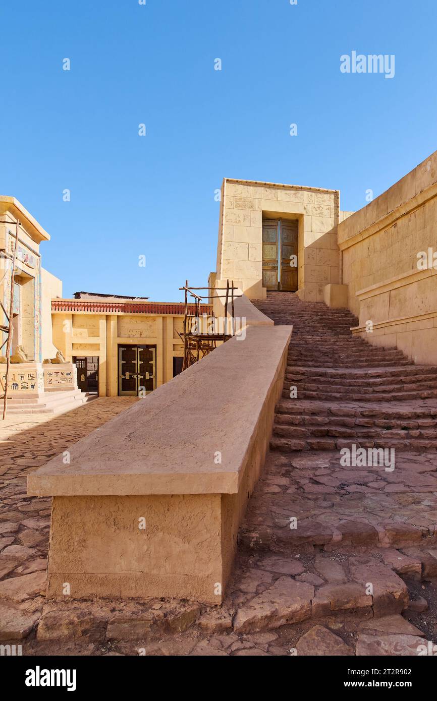 Stone staircase and wooden door in the desert of a village in Egypt ...