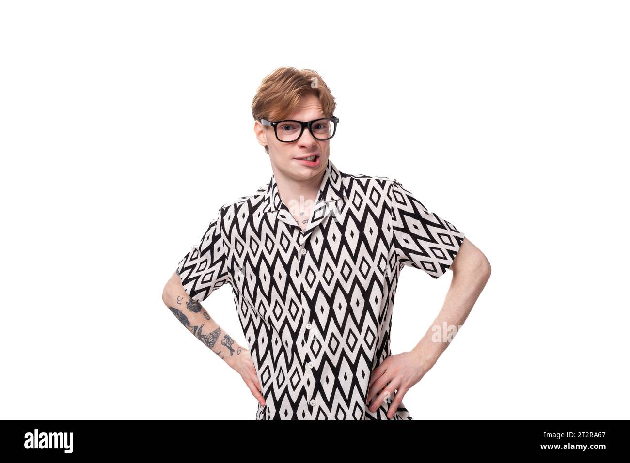 a young pleasant friendly caucasian ginger man with a tattoo on his ...