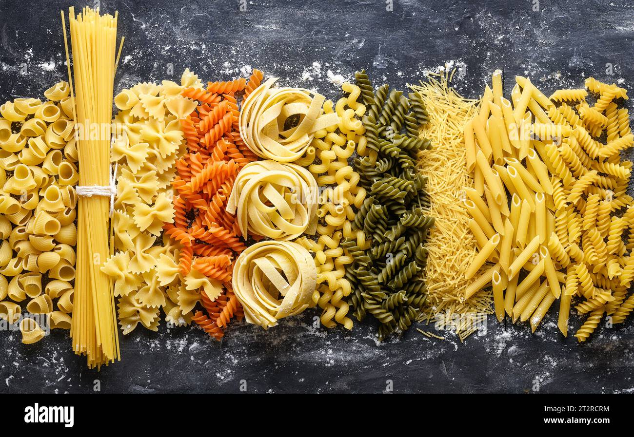 Different of types and shapes of uncooked pasta Stock Photo - Alamy