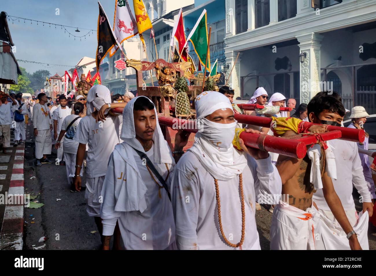 Palanquin bearers in a procession during the Vegetarian Festival (Nine ...