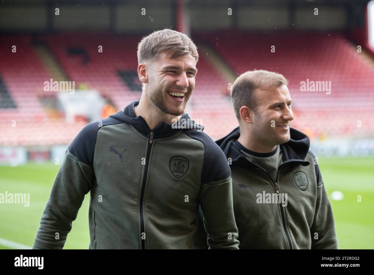John Mcatee #45 of Barnsley and Herbie Kane #8 of Barnsley arrive ...