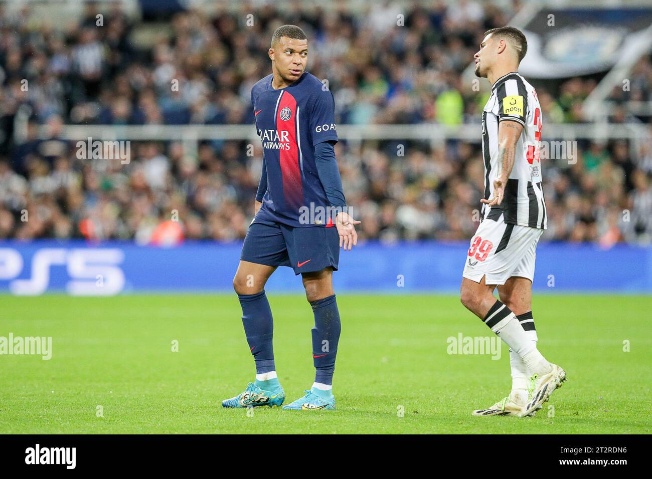 Kylian Mbappe of Paris Saint-Germain and Bruno Guimaraes of Newcastle ...