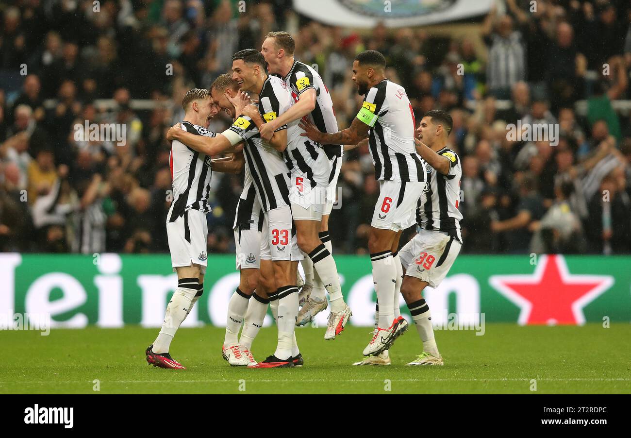 GOAL 2-0, Dan Burn of Newcastle United goal celebration with Miguel ...