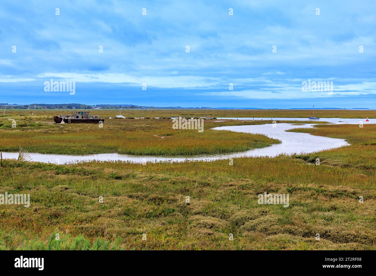 The channel from Blakeney Quay to the sea winds through extensive salt ...