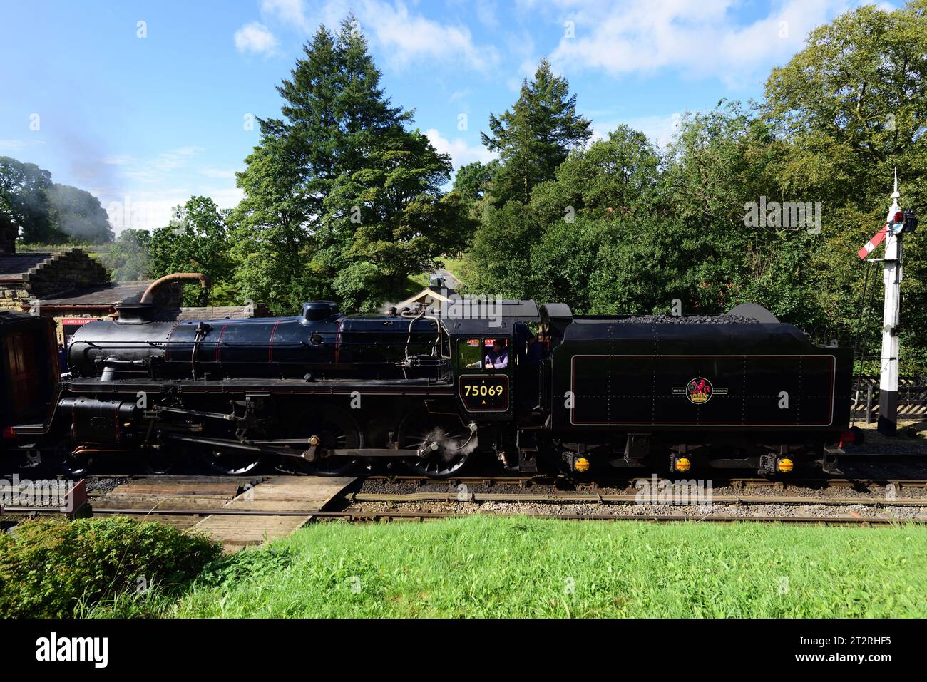 Running tender first, BR Standard Class 4 No 75069 waits to leave ...