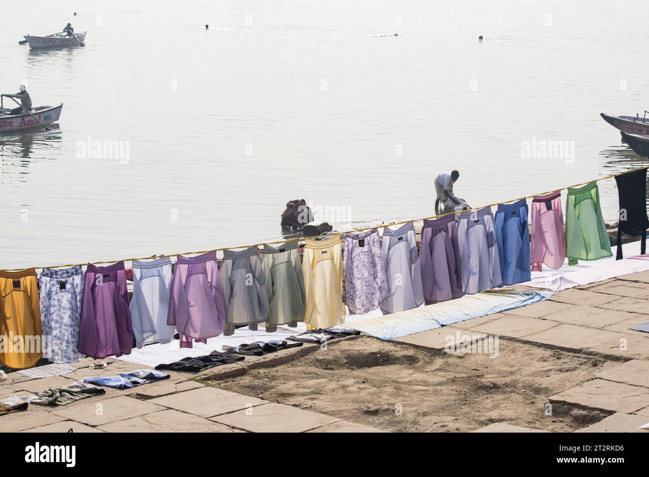 Washed clothes hanging up for drying at Ganges river in Varanasi Stock ...