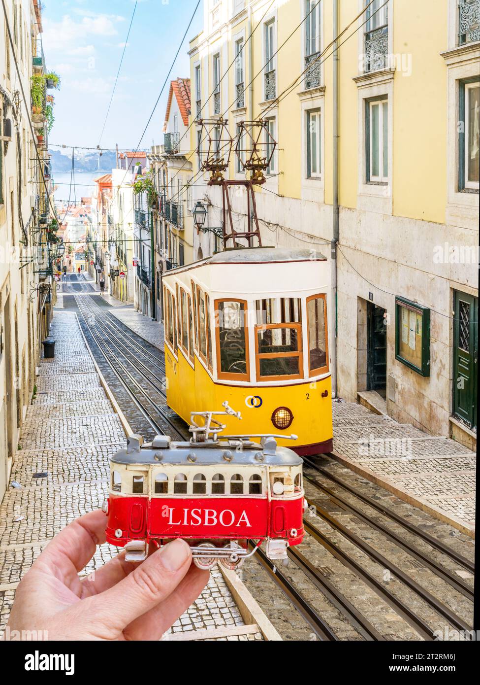 Bica Funicular, Elevador da Bica, cablecar historic with red Lisboa toy ...