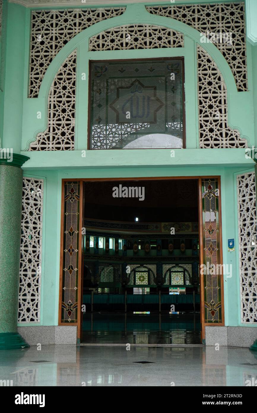 Arabic, Indonesian. Beautiful mosque entrance with Arabic ornaments ...