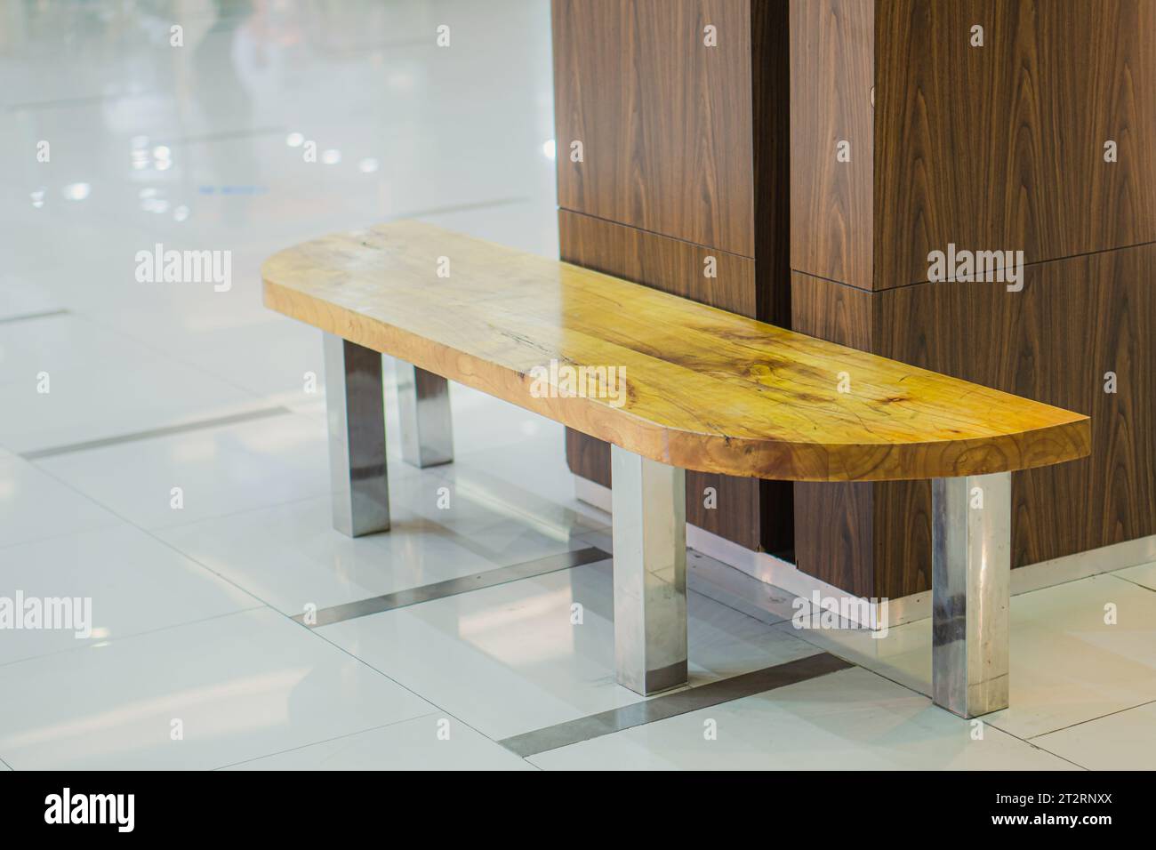 Wood bench in mall shopping Stock Photo - Alamy