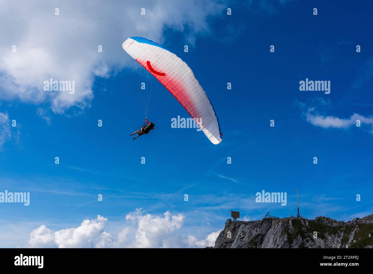 Tandem jump in the Swiss mountains Stock Photo - Alamy
