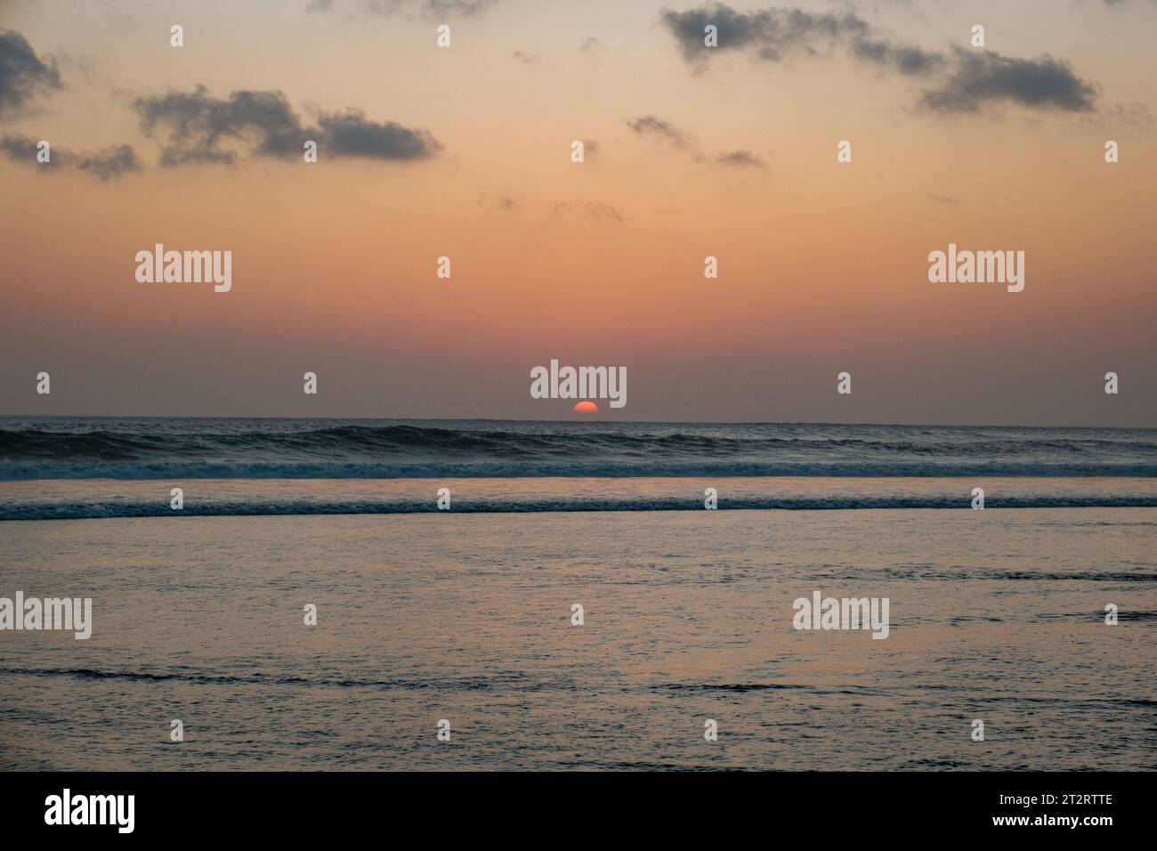 Behold the ethereal moments before sunset as the sun descends, painting ...