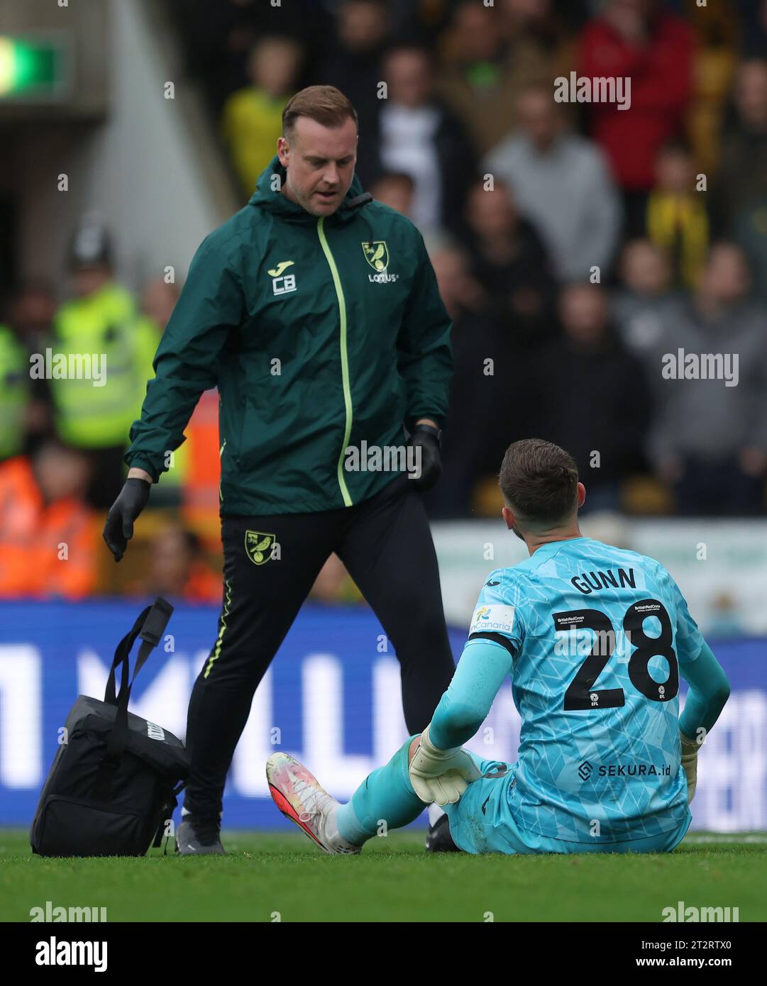 Norwich City goalkeeper Angus Gunn receives treatment during the Sky ...