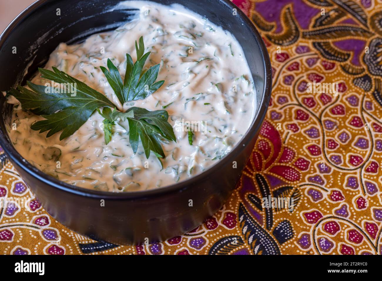 beiruti hummmus with parsley on top Stock Photo - Alamy