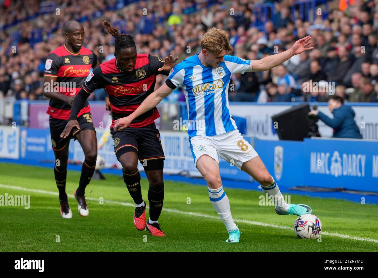 Osman Kakay #2 of Queens Park Rangers competes for the ball with Jack ...