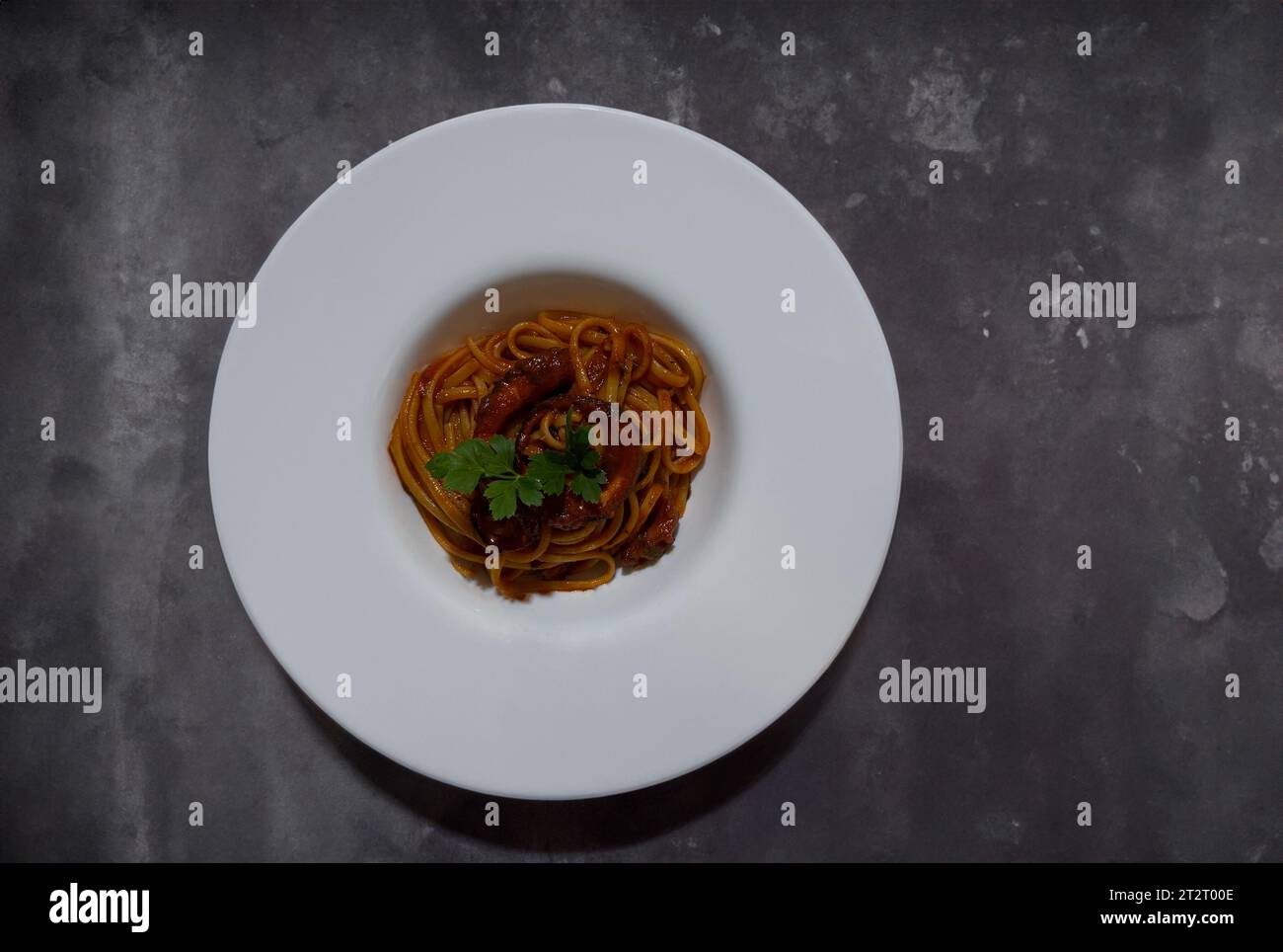 linguine with octopus ragu with garlic, parsley and chilli pepper ...