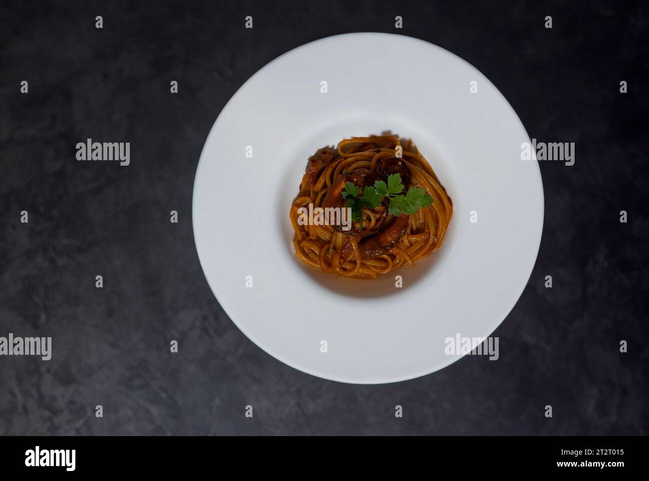 linguine with octopus ragu with garlic, parsley and chilli pepper ...