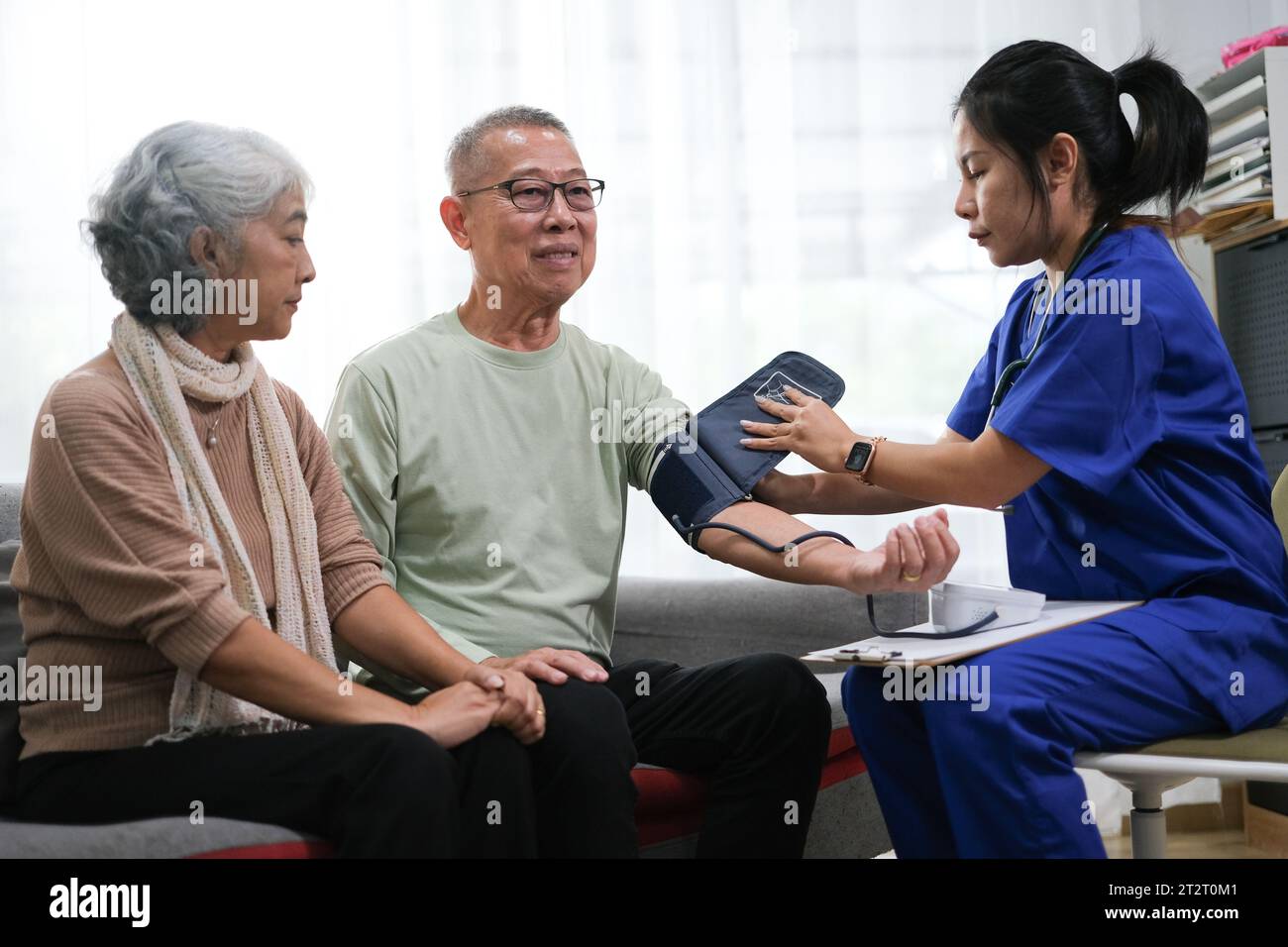 Attentive doctor or healthcare worker giving professional advice to ...