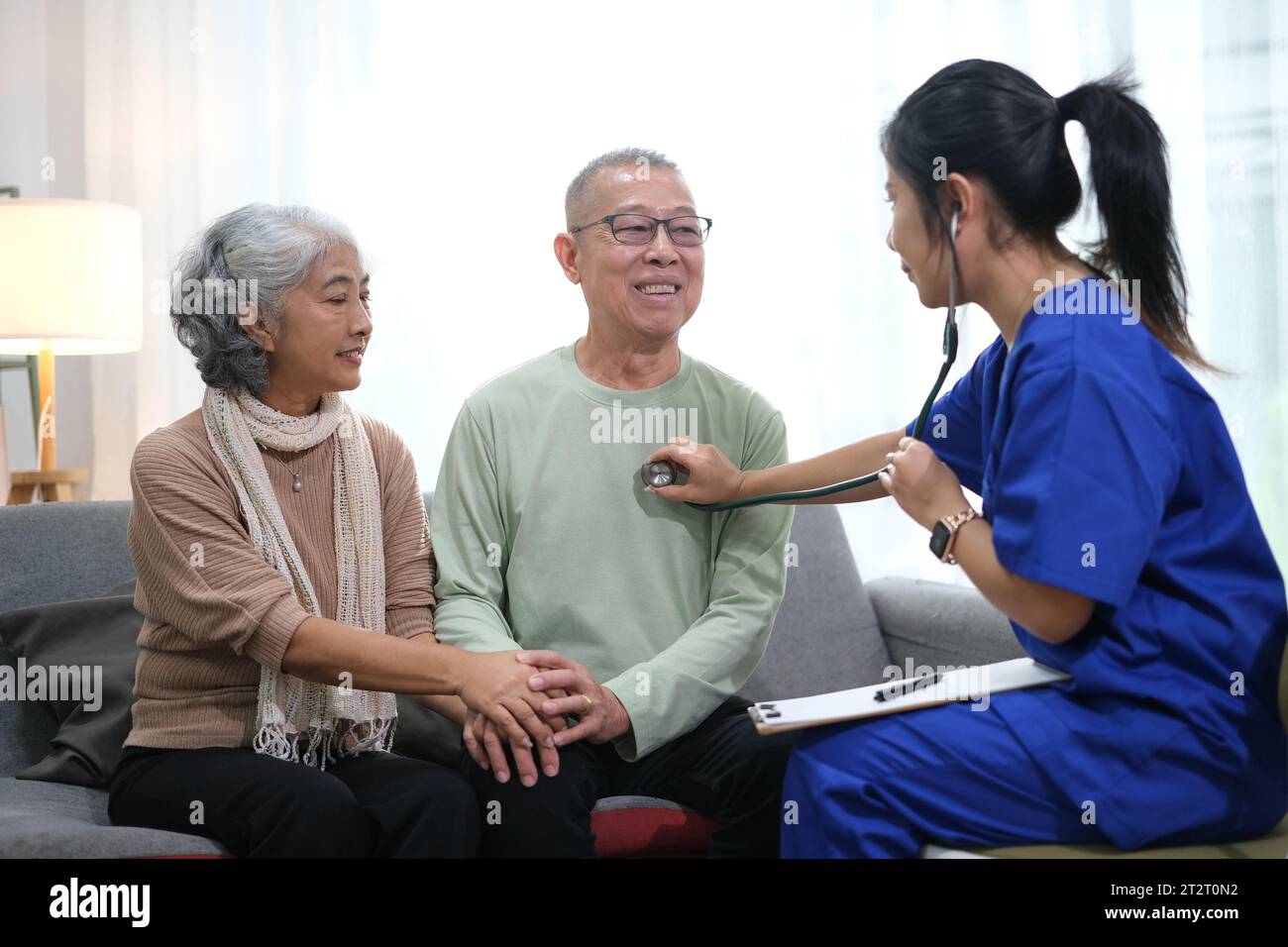 Attentive doctor or healthcare worker giving professional advice to ...