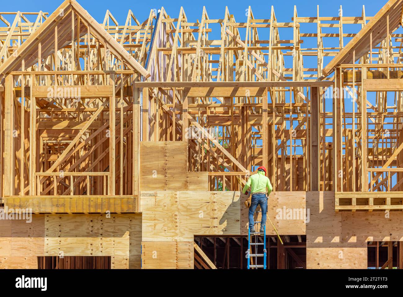 construction worker on a framing a house Stock Photo - Alamy