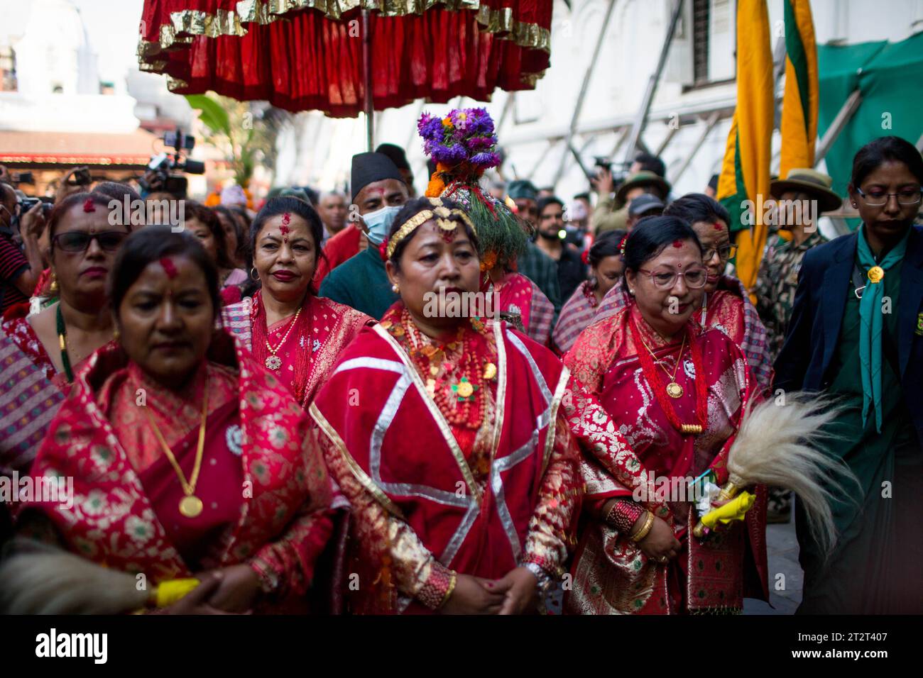 Kathmandu, Nepal. 21st Oct, 2023. Nepalese in traditional attire take part in a ceremony to ...