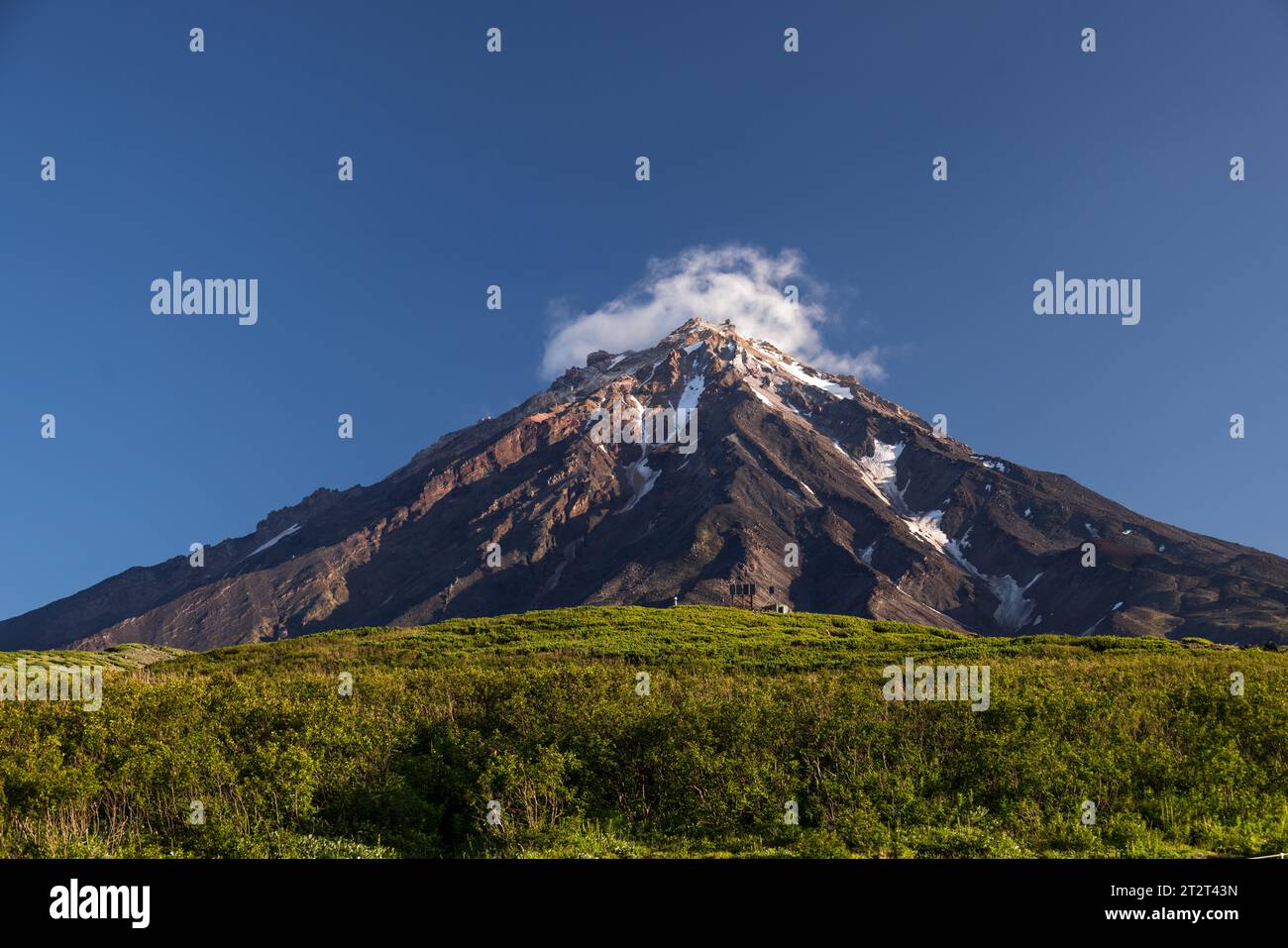 view of the peaks of the Koryak volcano on the Kamchatka peninsula ...