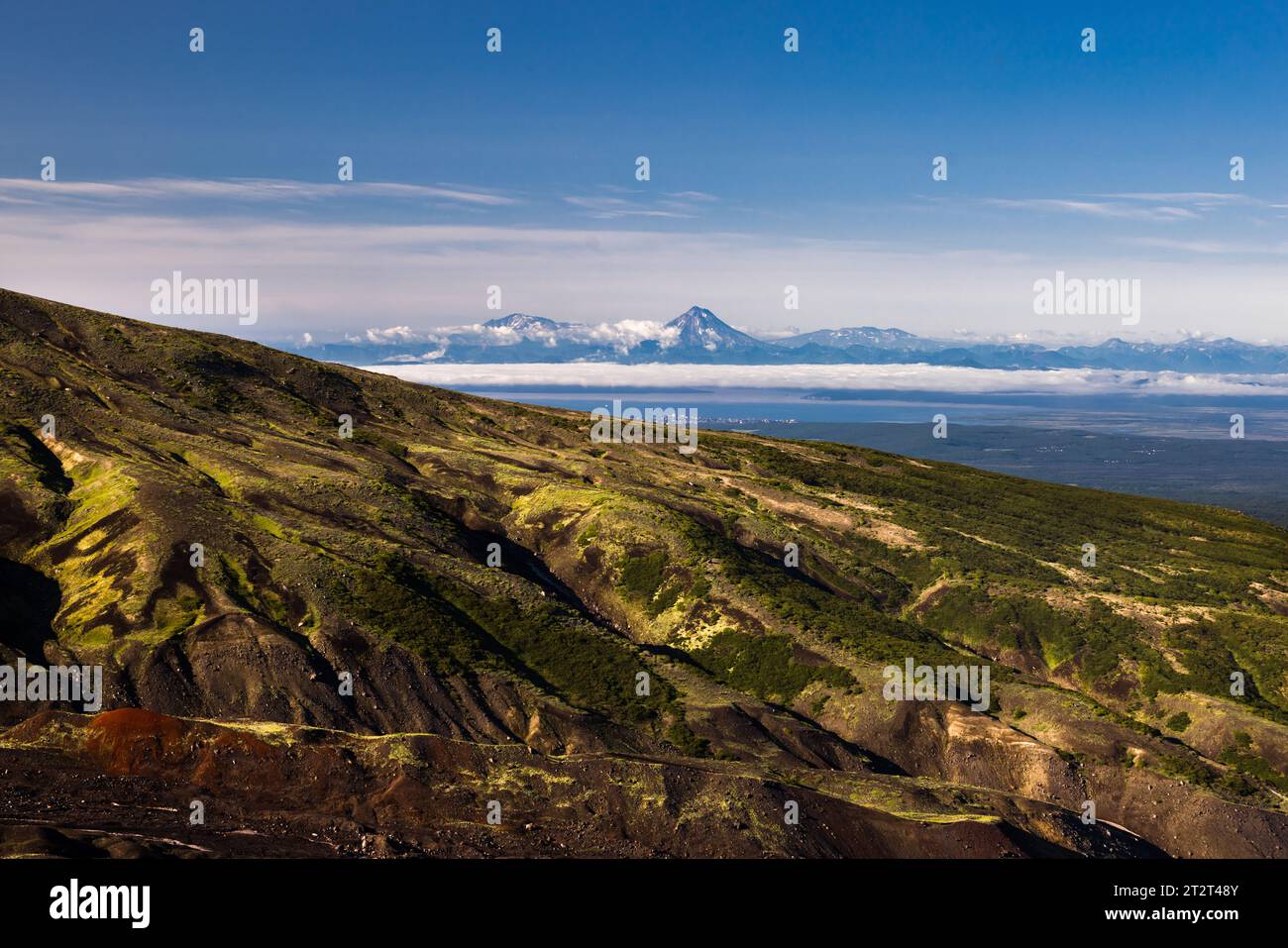 View of the Vilyuchinsky volcano from Avachinskaya Mountain. Natural ...