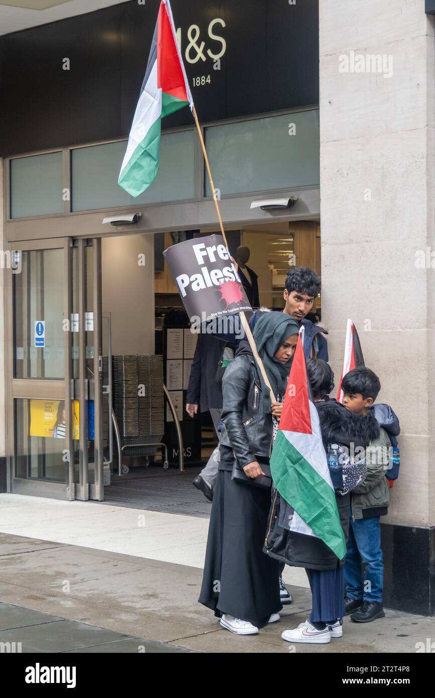 London, UK. 21 Oct 2023. Members of Fight Racism Fight Imperialism and ...