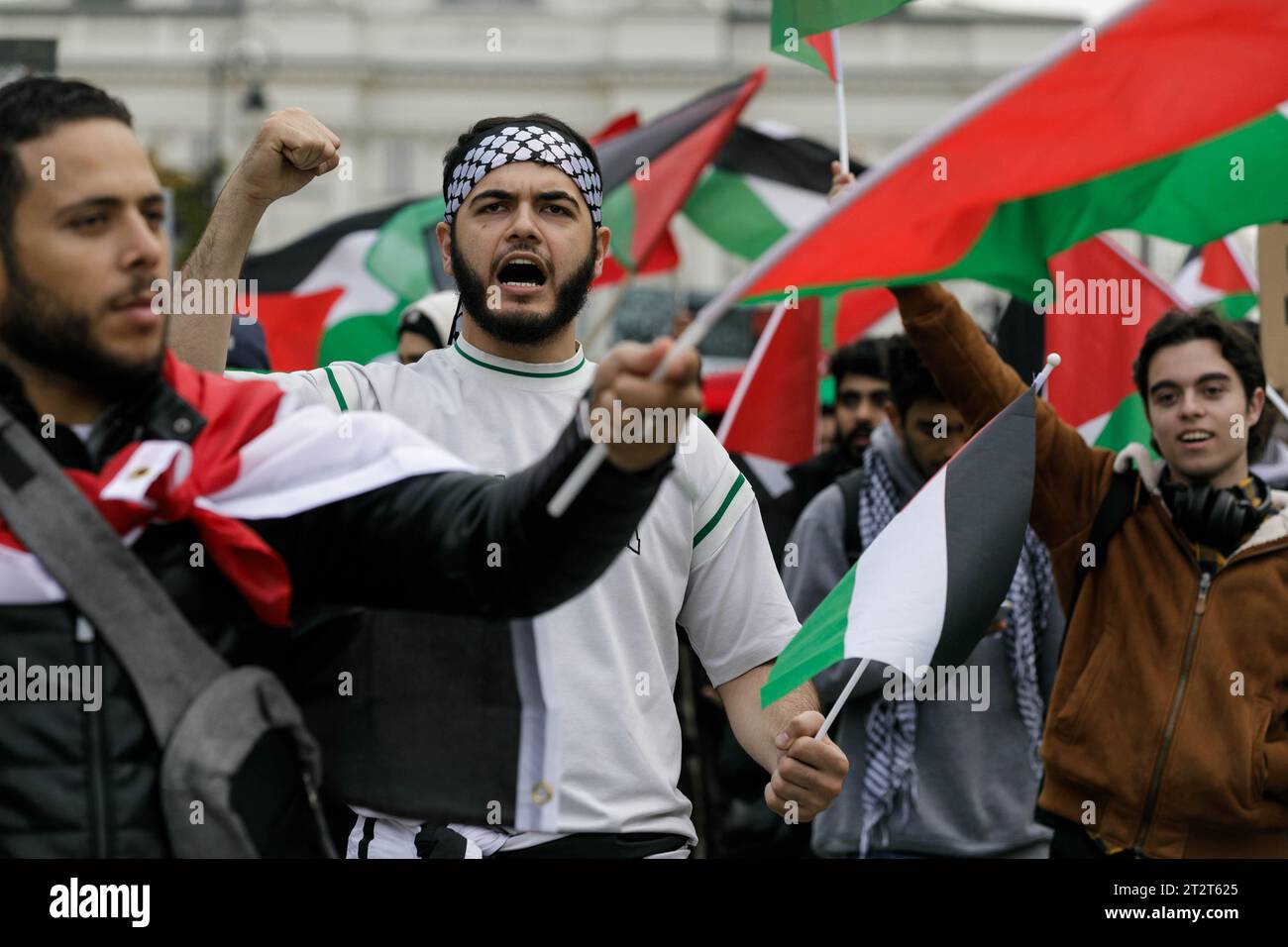 A man chants slogans and waves a Palestinian flag during the March of ...