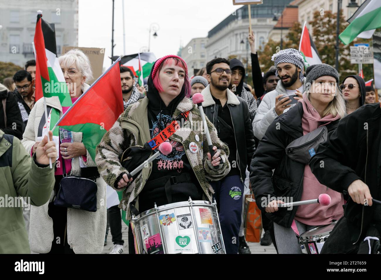Protesters are seen playing drums during the March of Solidarity with ...