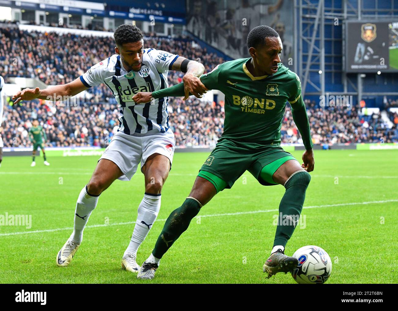 Mickel Miller #14 of Plymouth Argyle shields the ball during the Sky ...