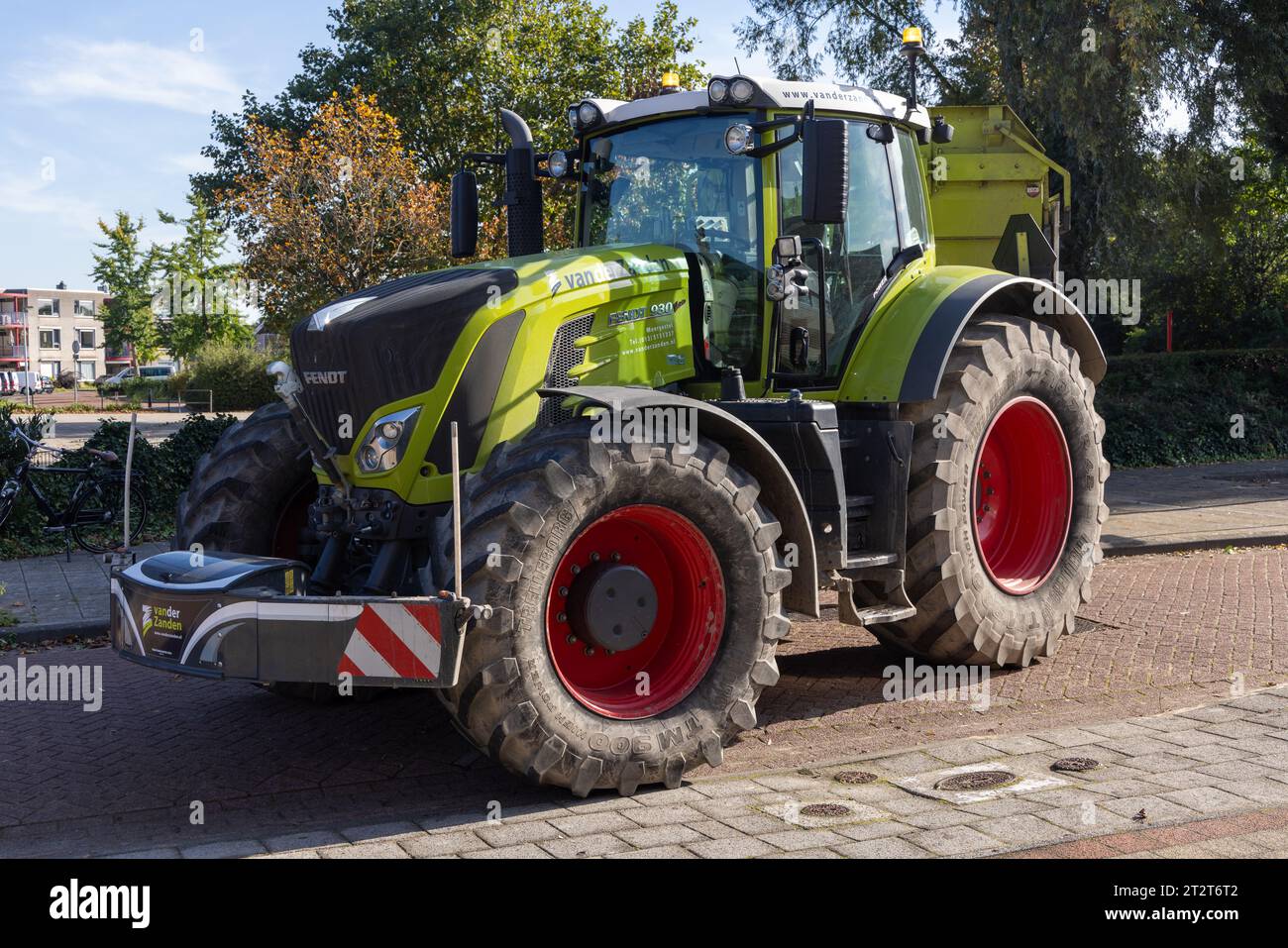 Fendt 930 Vario tractor working in park in residential urban area Stock ...