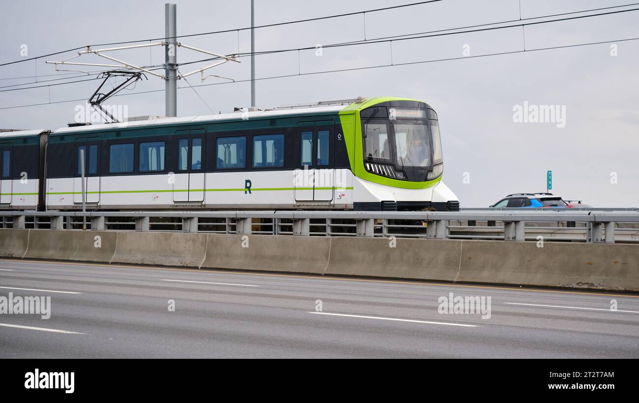 New REM light rail transit train going along Champlain bridge Stock ...