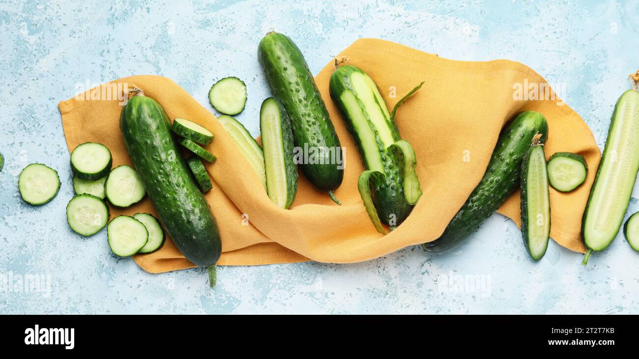 Many green cucumbers on light blue background, top view Stock Photo - Alamy