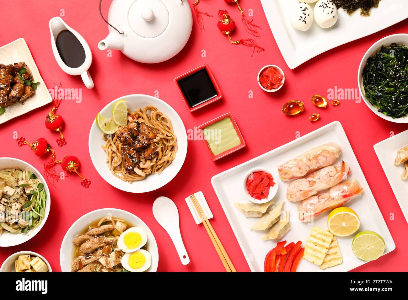 Composition with different Chinese food on red background Stock Photo ...