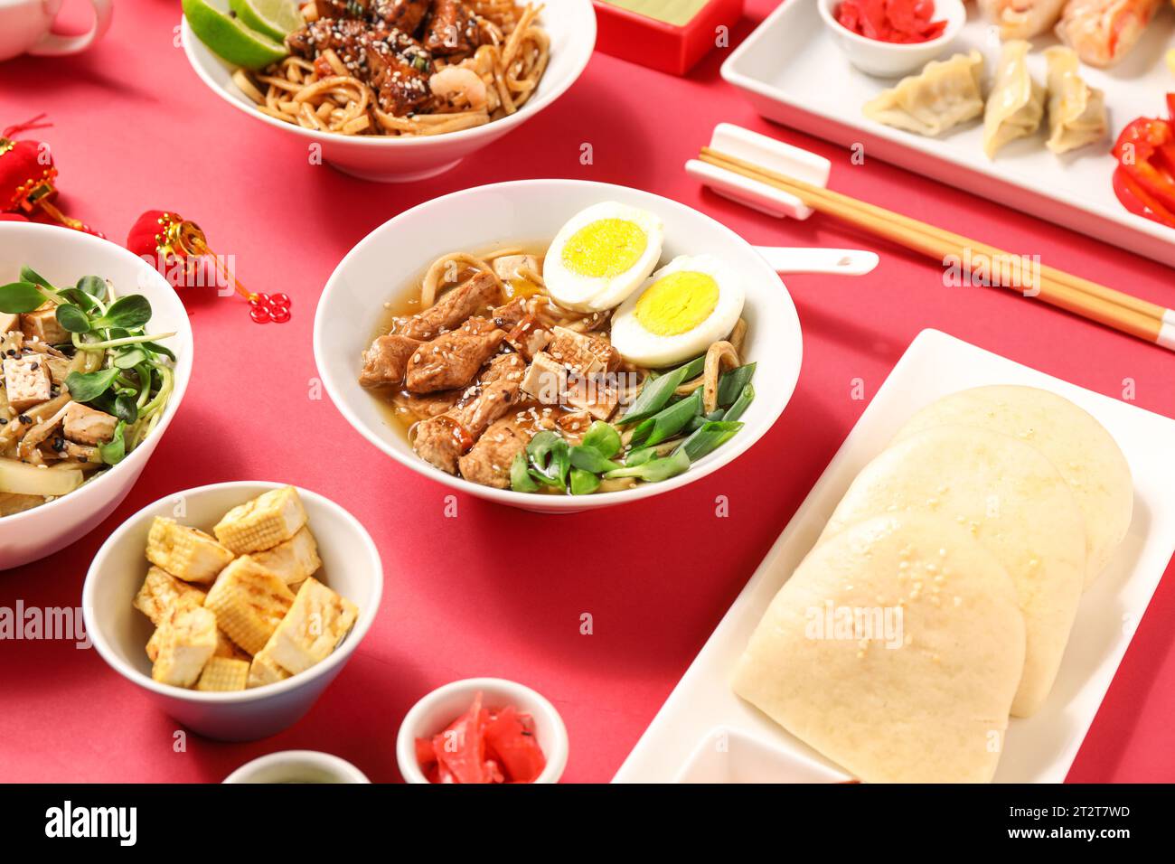 Composition with different Chinese food on red background Stock Photo ...