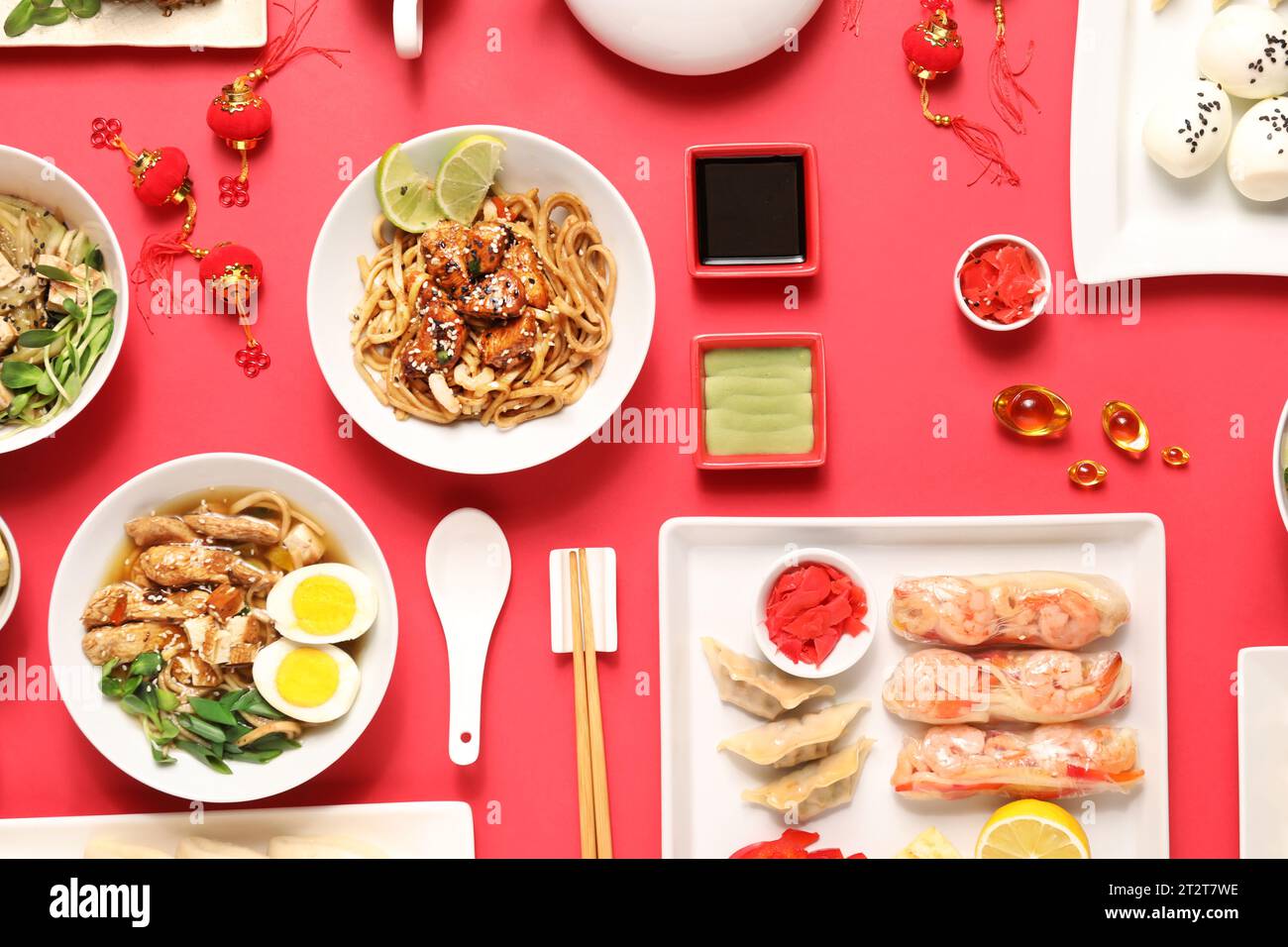 Composition with different Chinese food on red background Stock Photo ...