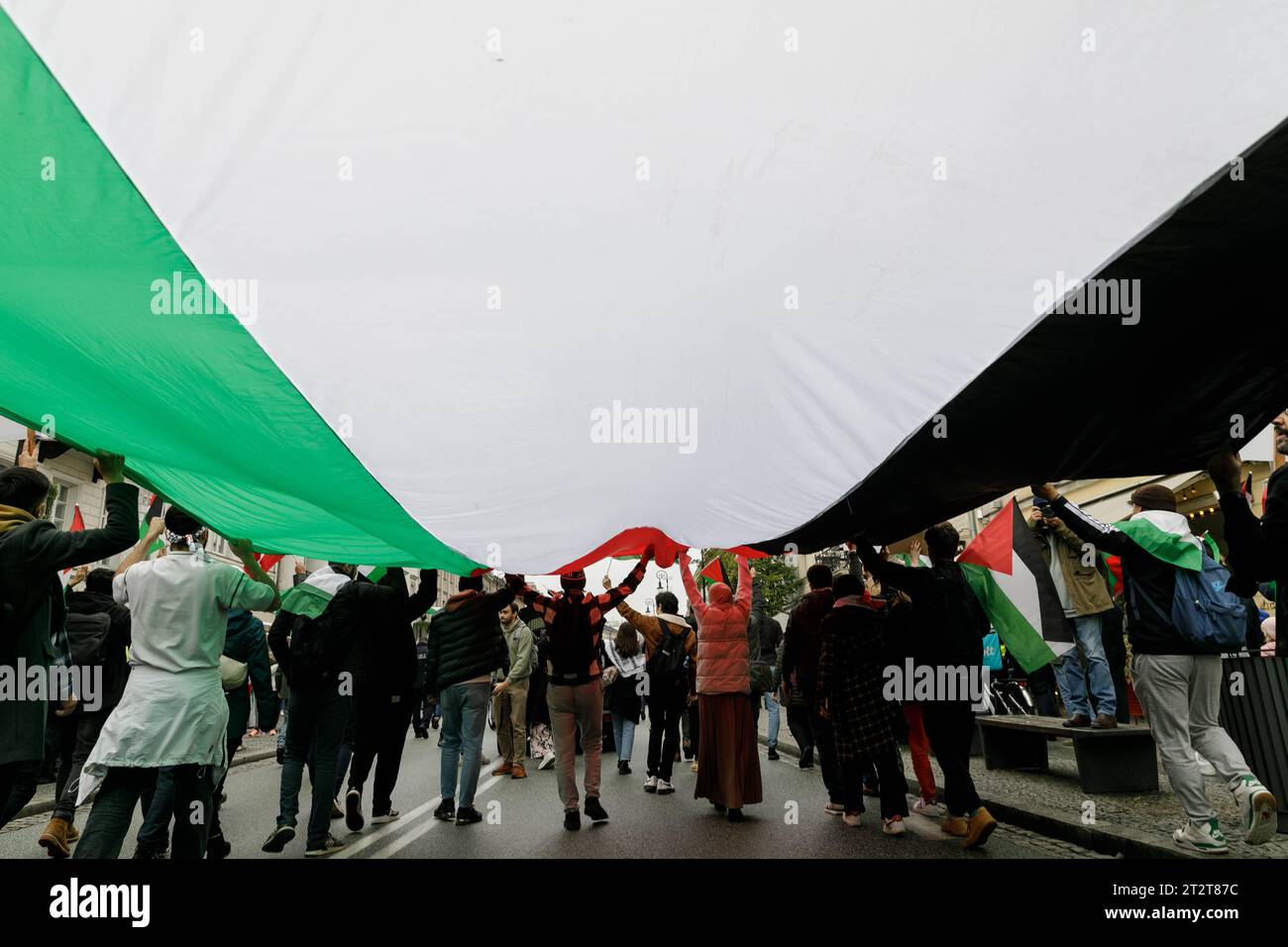 Participants of the March of Solidarity with Palestine carry a large ...