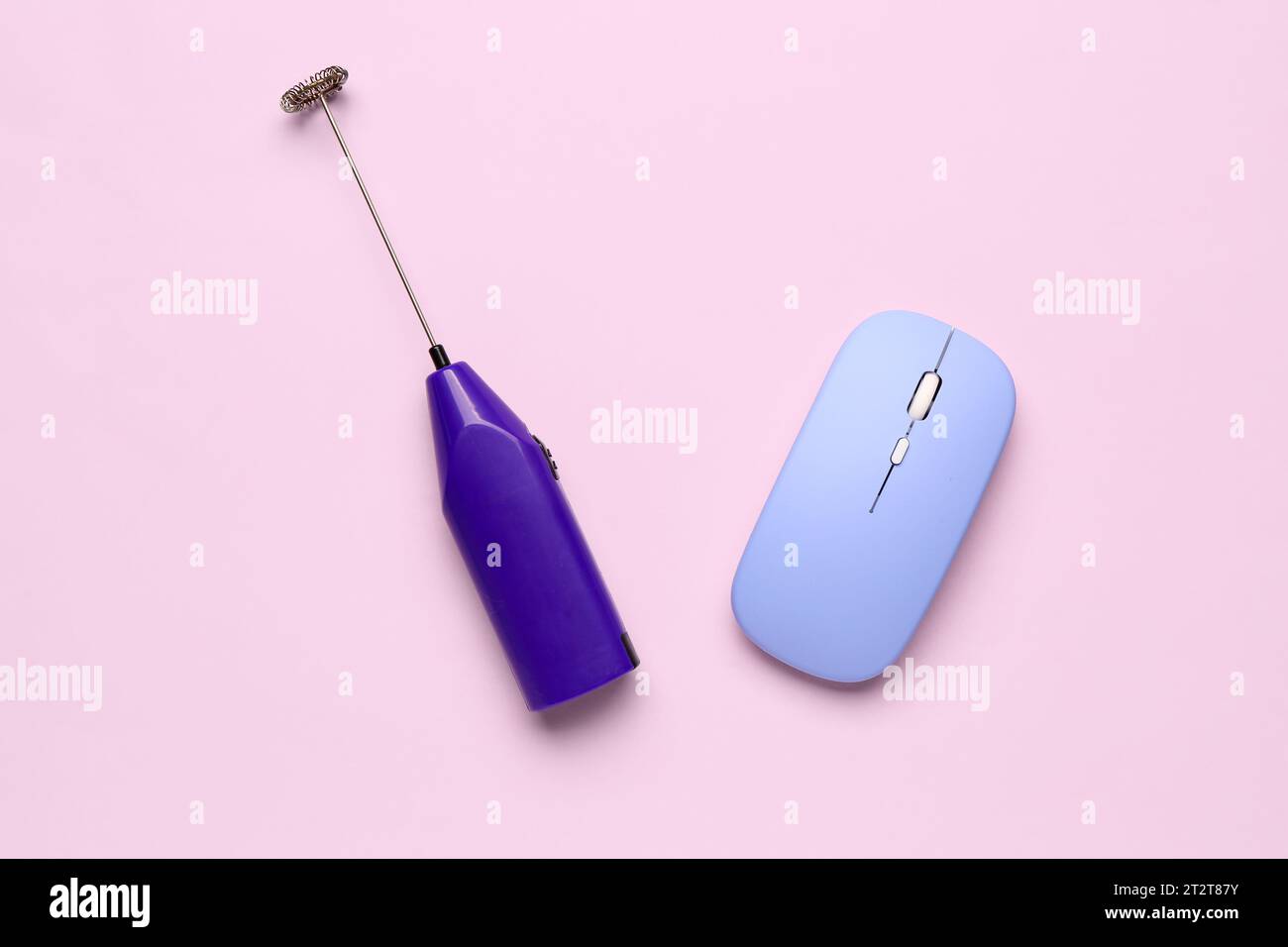 Computer mouse with mixer on pink background Stock Photo - Alamy