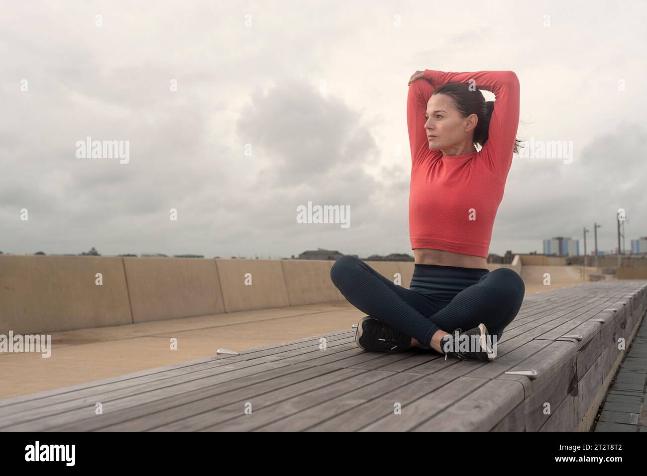 Woman exercise arms crossed hi-res stock photography and images - Alamy