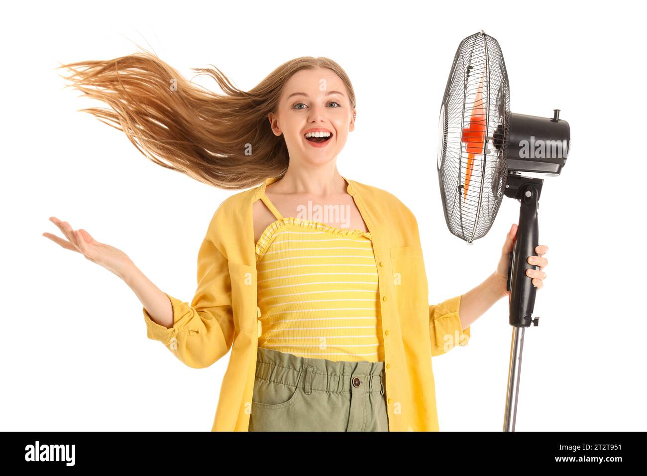 Young woman with electric fan on white background Stock Photo - Alamy