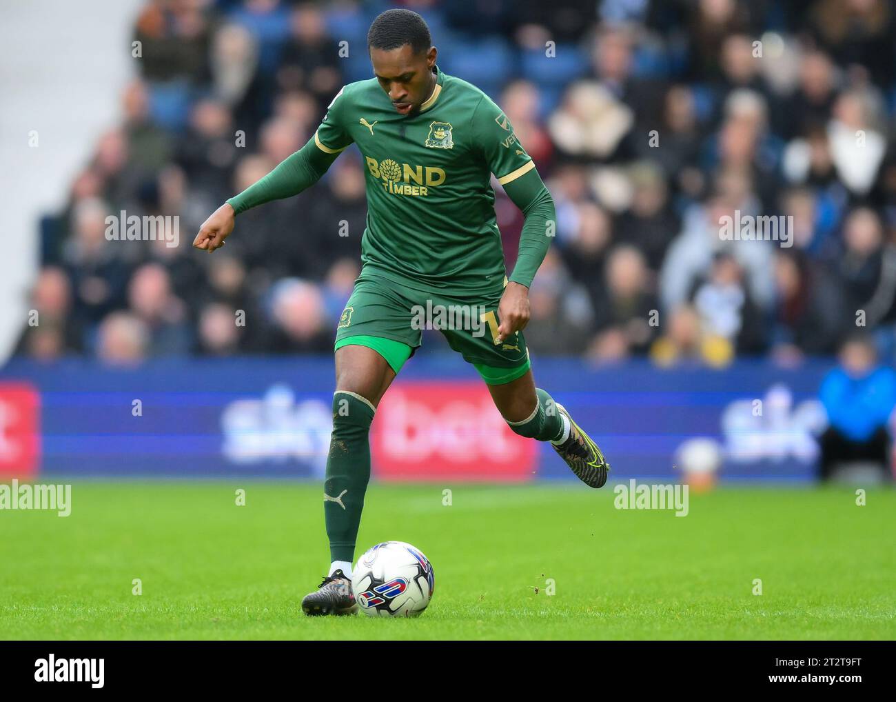 Mickel Miller #14 of Plymouth Argyle on the ball during the Sky Bet ...