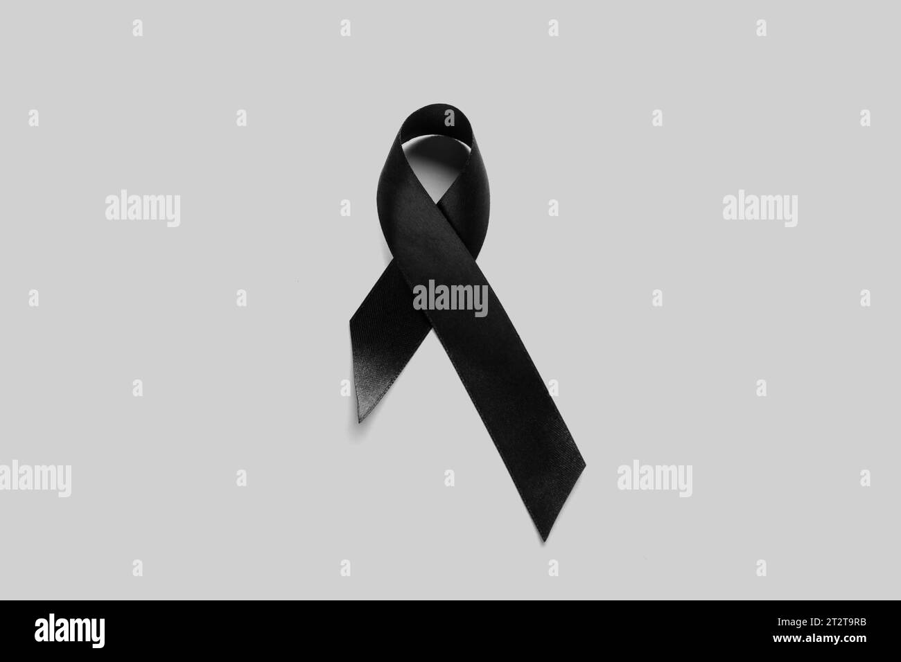 Black funeral ribbon on grey background Stock Photo - Alamy