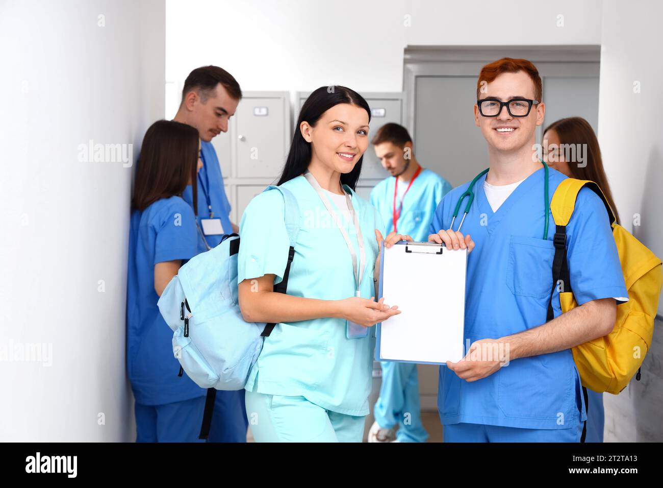 Medical students with clipboard at university hall Stock Photo - Alamy