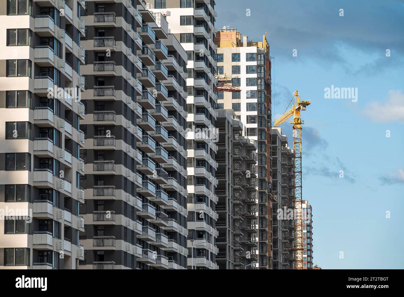 Row houses construction crane hi-res stock photography and images - Alamy